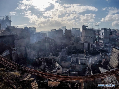 Aftermath of fire at residential area in Manila, the Philippines ...