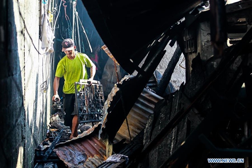 Aftermath of fire at residential area in Manila, the Philippines ...