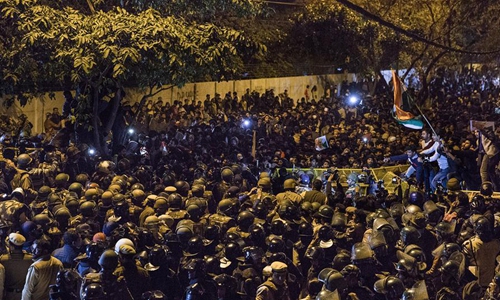 Massive protests erupt in Indian capital following firing on student ...