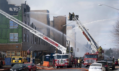 Virginia building fire contained, crew hitting hotspots - Global Times
