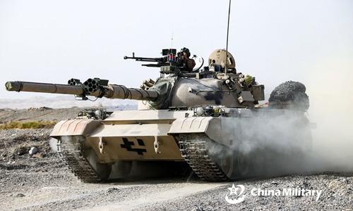 MBTs pass through man-made obstacles - Global Times