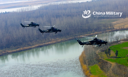 Attack helicopters fly at ultra-low altitude - Global Times