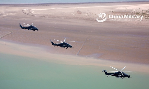 Attack helicopters fly at ultra-low altitude - Global Times
