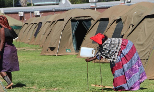 Homeless people use Tippy-Tap hand-washing techniques in Windhoek ...