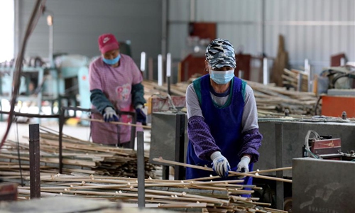 Workers make bamboo products in Rongan County, S China - Global Times