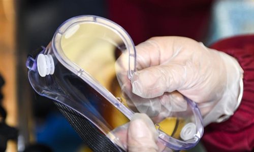 Medical protective goggles produced at factory in Helong, NE China ...