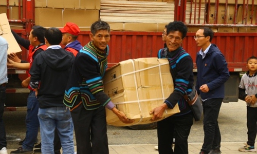 Clifftop villagers resettled in town as part of China's poverty ...