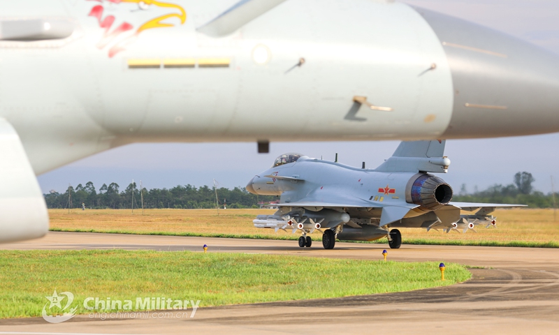 J-10 fighter jets take off for combat training - Global Times
