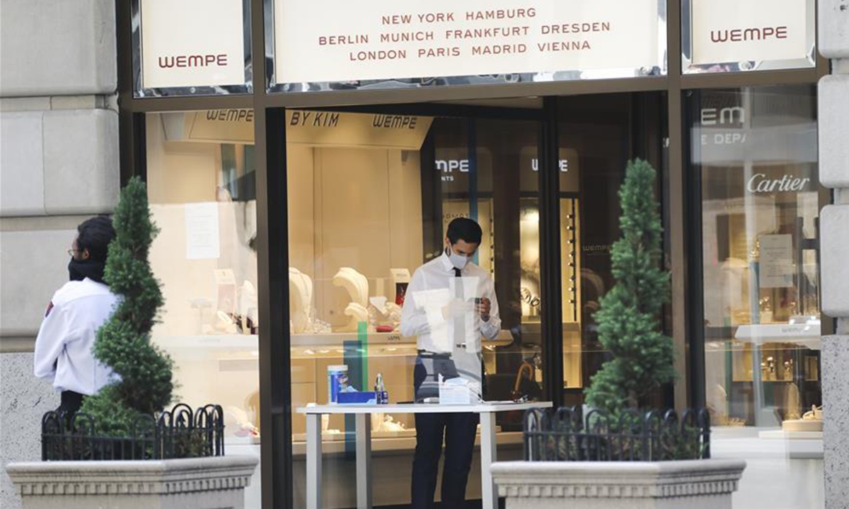 Stores on Fifth Avenue resume business amid phase one reopening in New ...