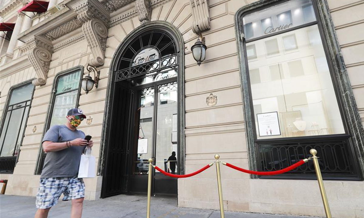 Stores on Fifth Avenue resume business amid phase one reopening in New ...
