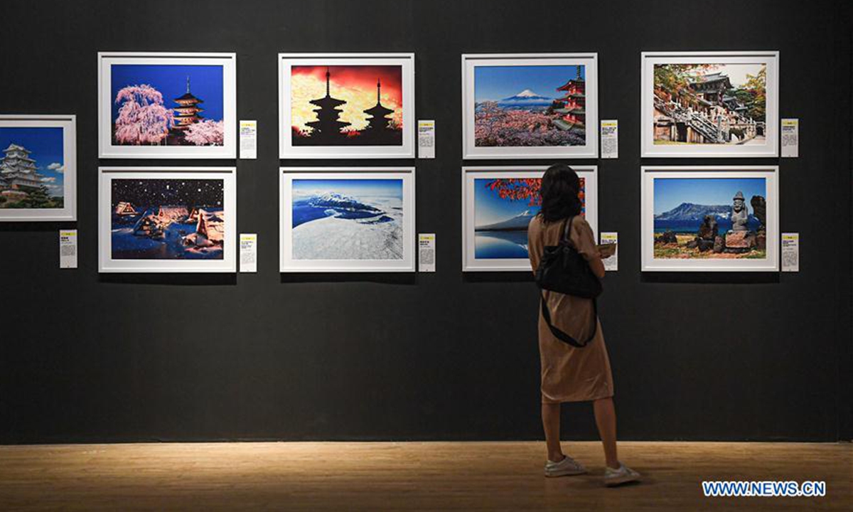 World cultural heritage photography art exhibition opens in Hainan ...