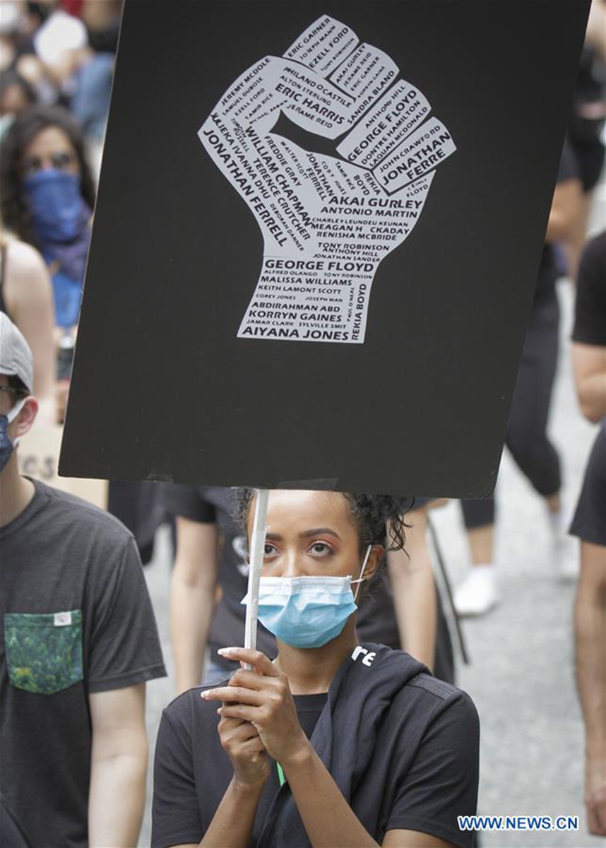 People participate in Juneteenth Freedom March in Vancouver, Canada ...
