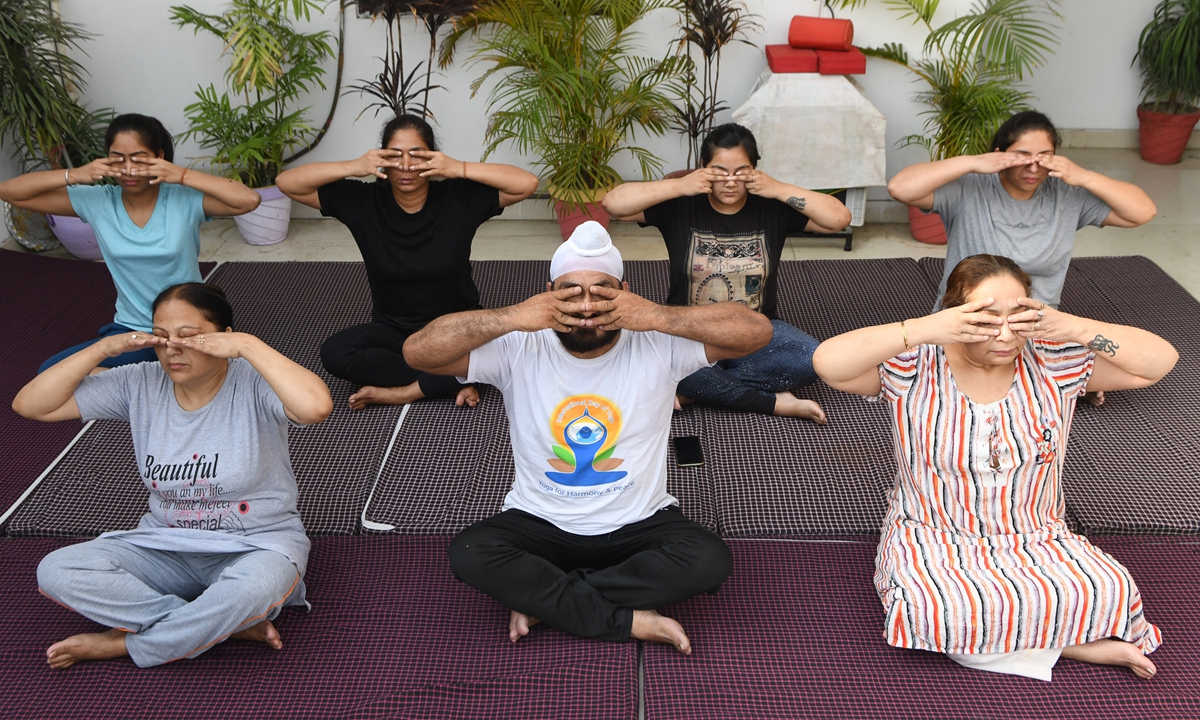 Enlightened Yogis - Global Times
