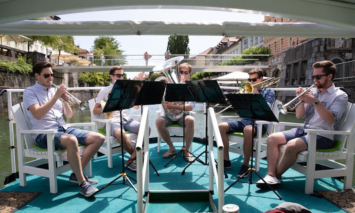 Musicians perform during cruise concert in Ljubljana, Slovenia - Global ...