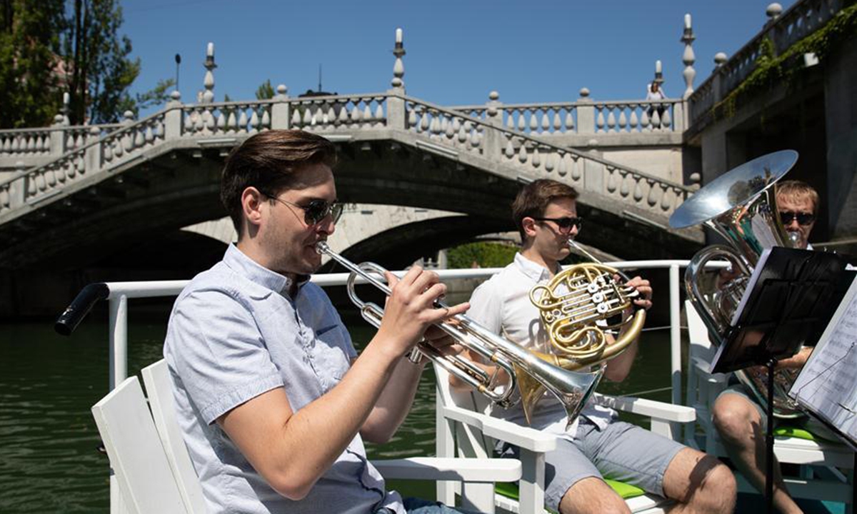 Musicians perform during cruise concert in Ljubljana, Slovenia - Global ...