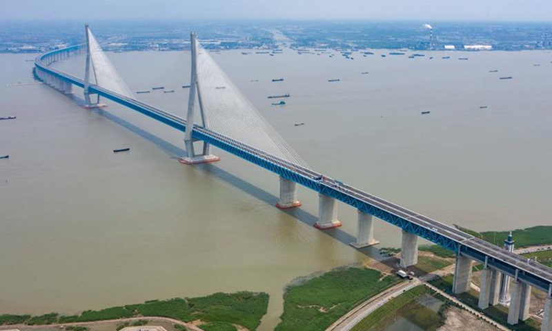 Road-rail cable-stayed bridge with world's longest span opens to ...