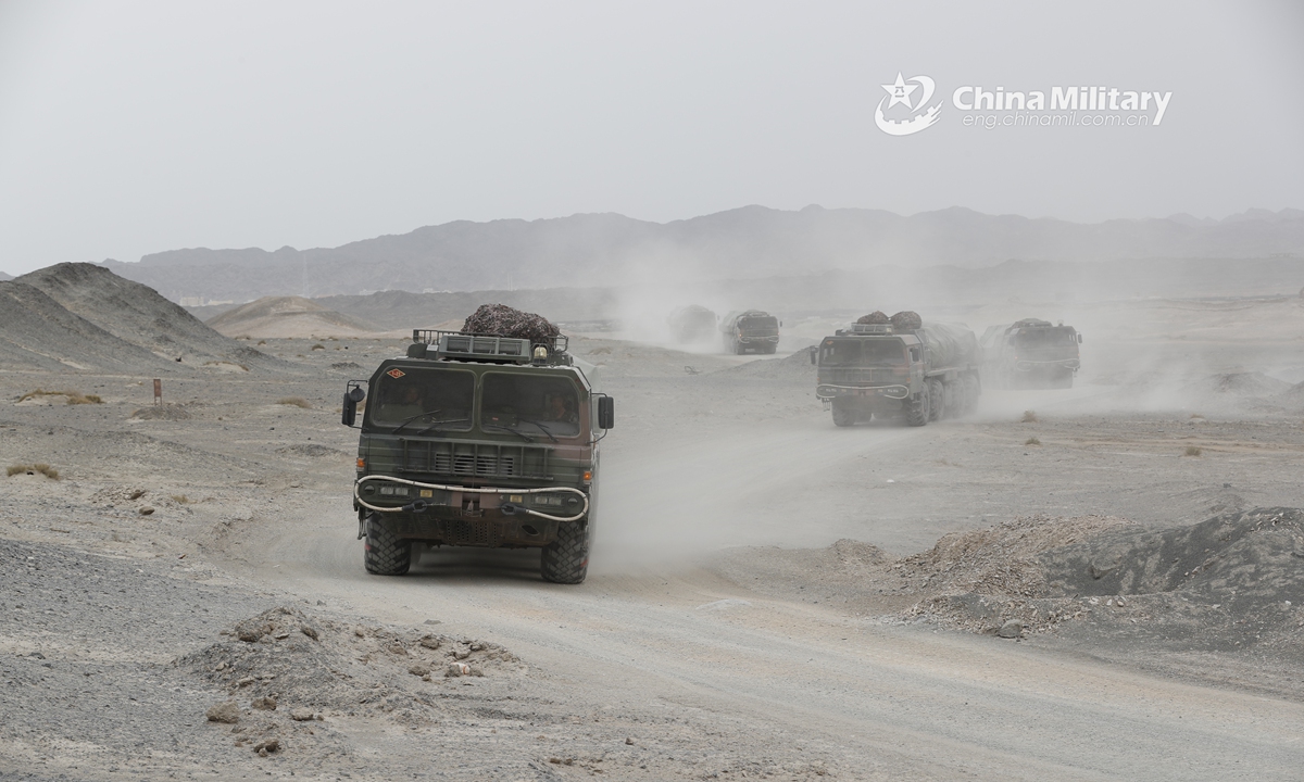 Military truck convoy en route to training field - Global Times