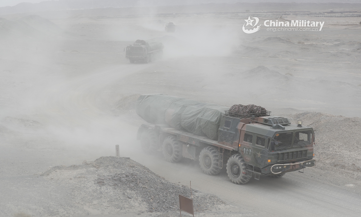 Military truck convoy en route to training field - Global Times