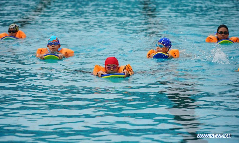 Children learn swimming skills in Shahe, China's Hebei - Global Times