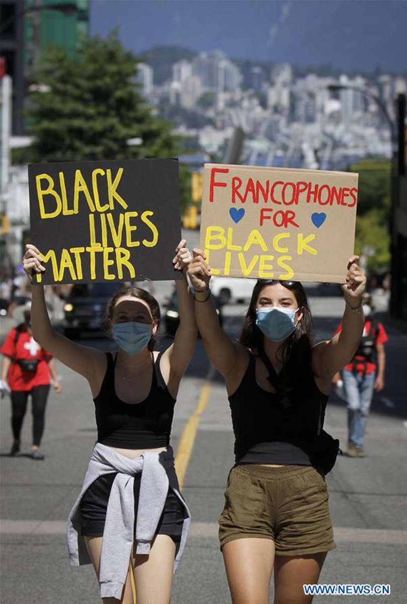 Protestors take part in Emancipation Day march in Vancouver, Canada ...