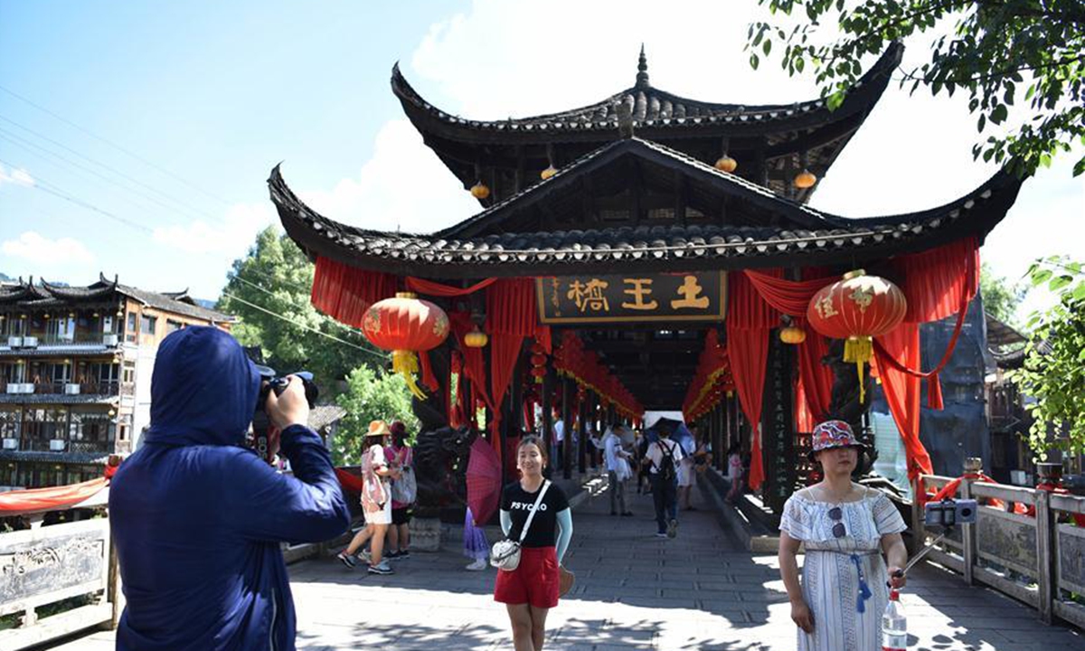 Tourists enjoy leisure time in Yongshun County, China's Hunan - Global ...
