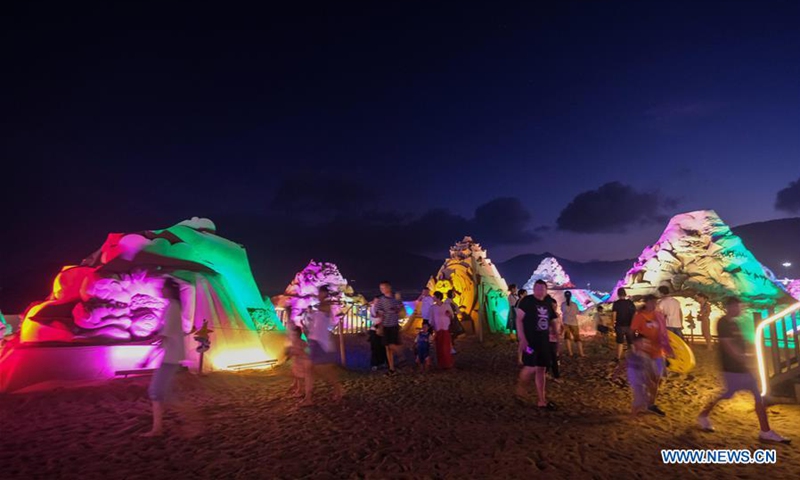 Tourists enjoy seaside time at Nansha beach resort in Zhejiang - Global ...