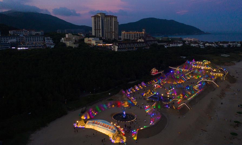 Tourists enjoy seaside time at Nansha beach resort in Zhejiang - Global ...