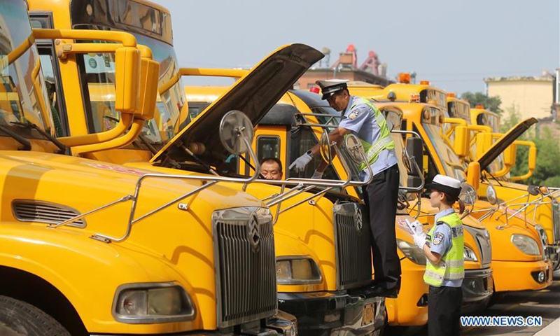 Police carry out safety checks on school buses before upcoming new ...
