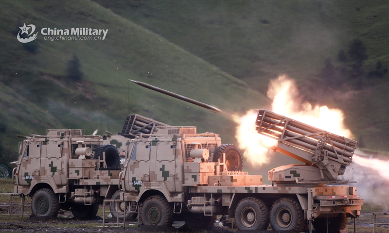 Firing rockets at mock targets - Global Times