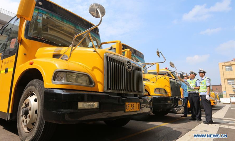 Police carry out safety checks on school buses before upcoming new ...