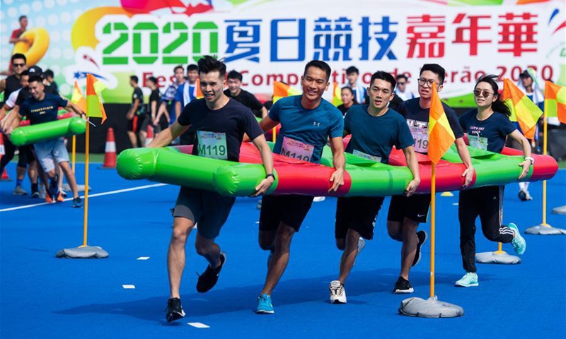 Competitors participate in festival competition in Macao - Global Times