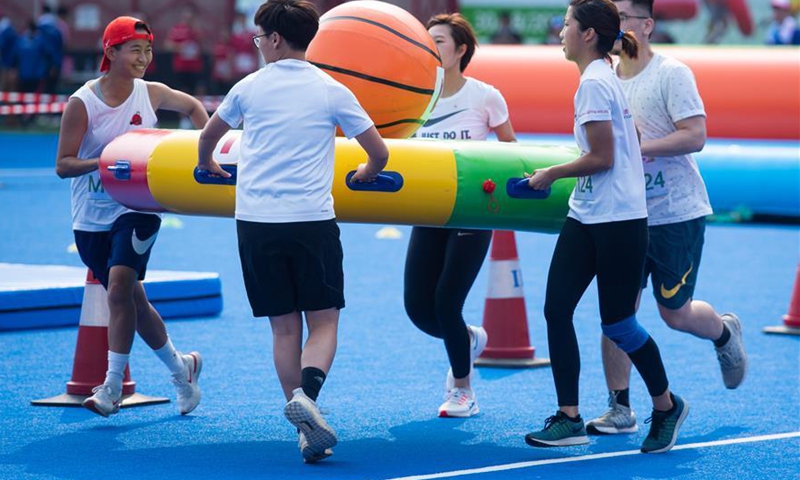 Competitors participate in festival competition in Macao - Global Times