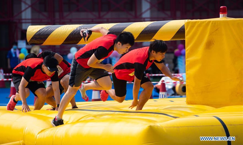 Competitors participate in festival competition in Macao - Global Times
