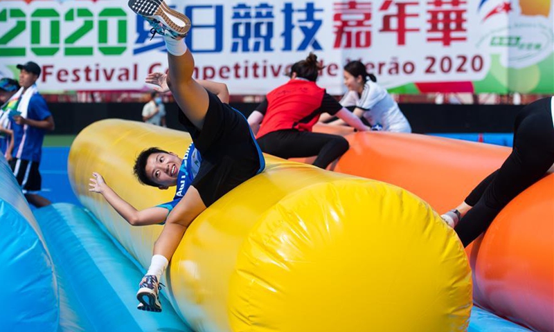 Competitors participate in festival competition in Macao - Global Times