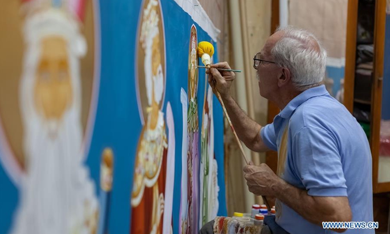 Local painter draws religious icons in West Bank city of Bethlehem ...