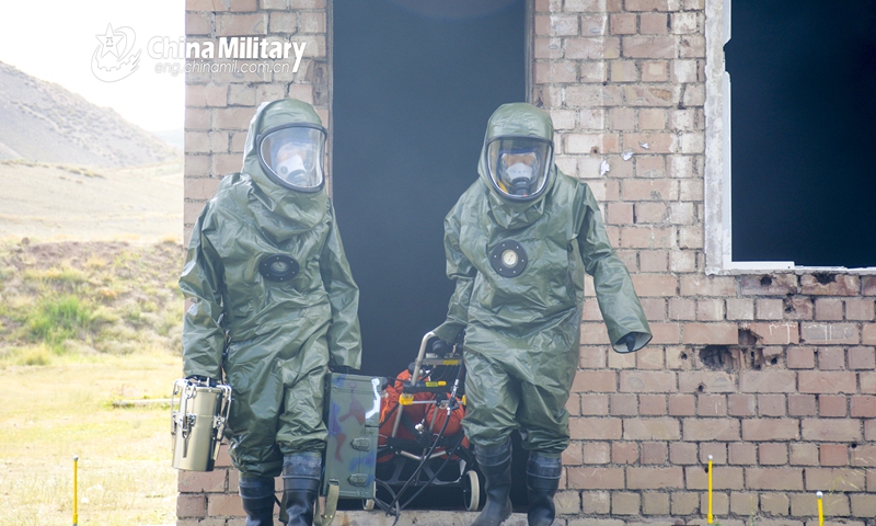 Chemical defense troops take samples from scenario affected area ...
