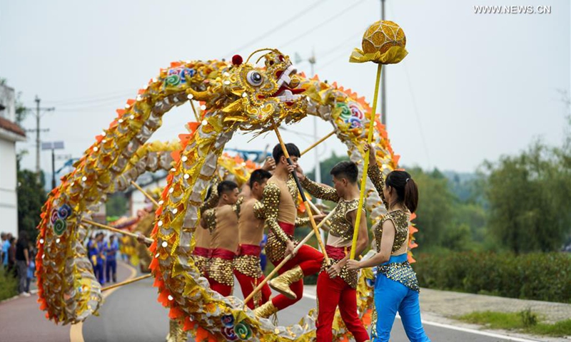 Villagers celebrate upcoming Chinese farmers' harvest festival in SW ...