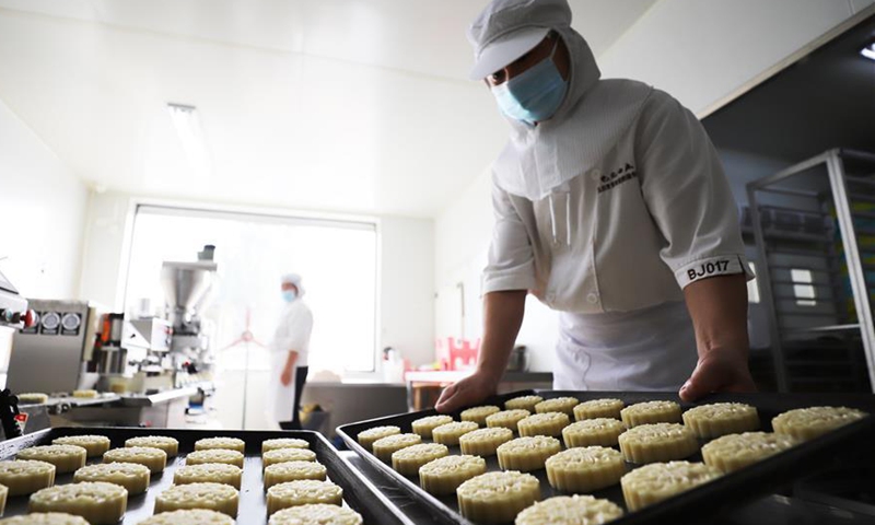 Food companies busy producing moon cakes ahead of Mid-Autumn Festival ...