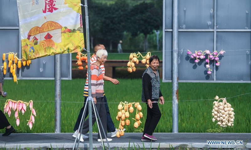Harvest festival held to welcome China's National Day holiday in E ...