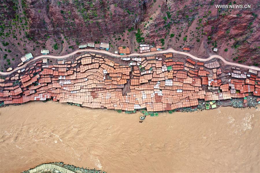Aerial view of colourful salt pans in SW China's Tibet - Global Times