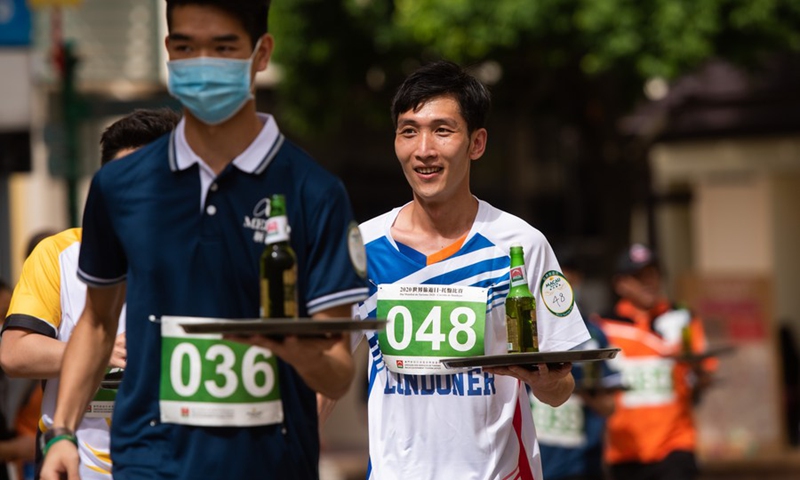 Traditional tray race held in Macao during World Tourism Day - Global Times