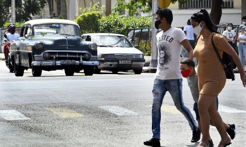 People wear face masks in Havana, Cuba - Global Times