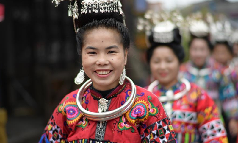 Villagers display traditional costumes at Danzhai Wanda Town, Guizhou ...