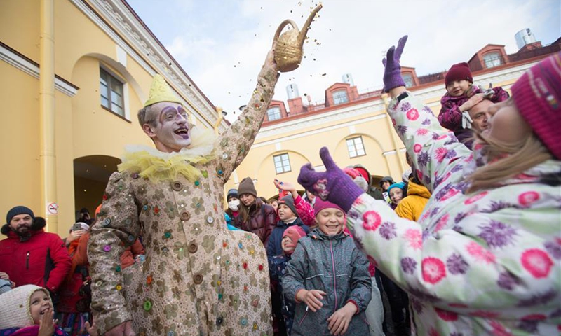 People watch performance during parade in St. Petersburg, Russia ...