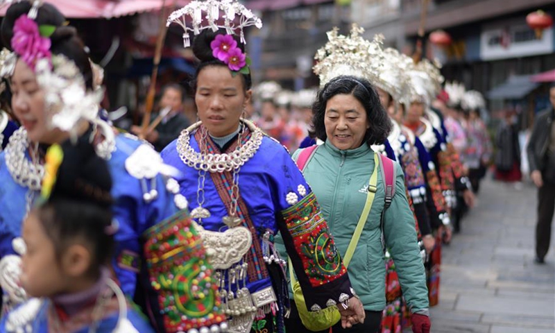 Villagers display traditional costumes at Danzhai Wanda Town, Guizhou ...