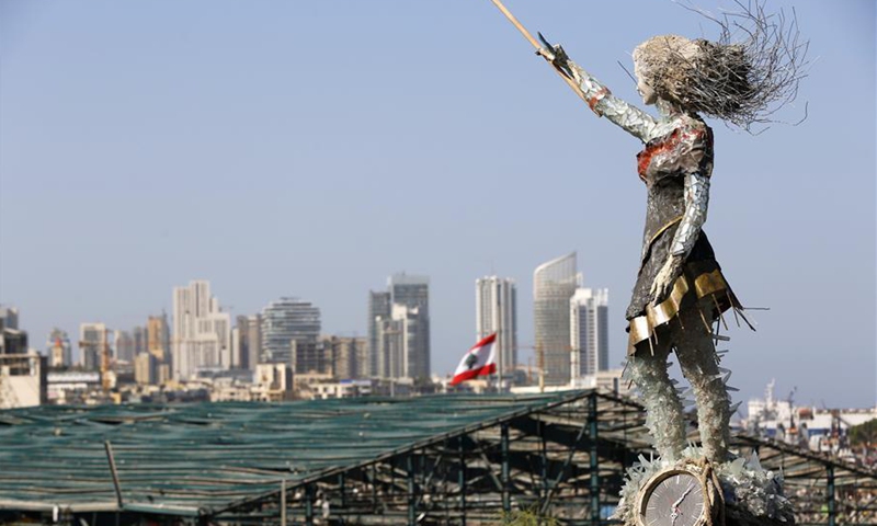 Lebanese artists create statue of lady by using rubbles of Beirut port ...