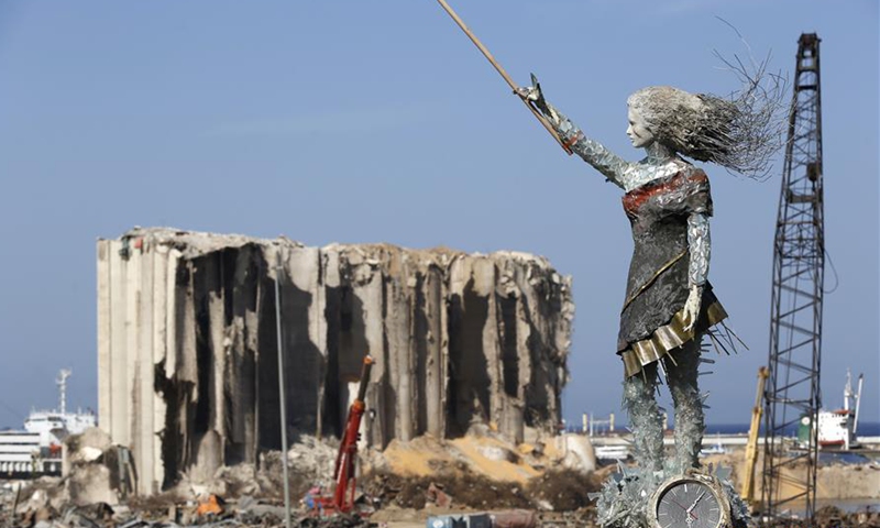 Lebanese artists create statue of lady by using rubbles of Beirut port ...