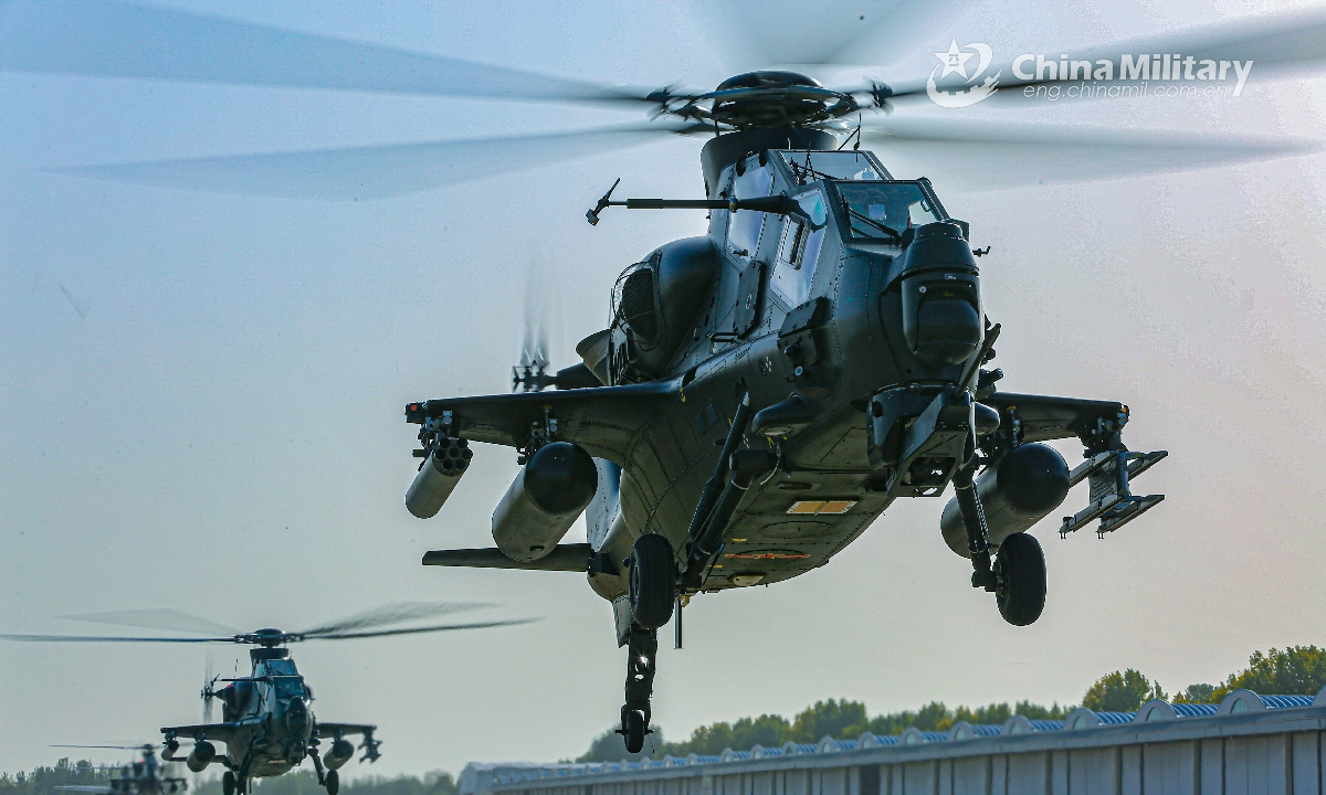 Multi-type attack helicopters hover at low altitude - Global Times