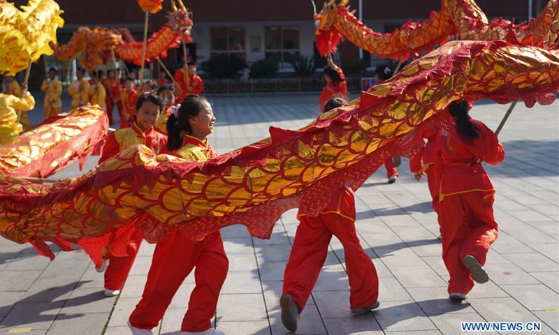 Chinese traditional lion dance taught at primary school in Jiangxi ...