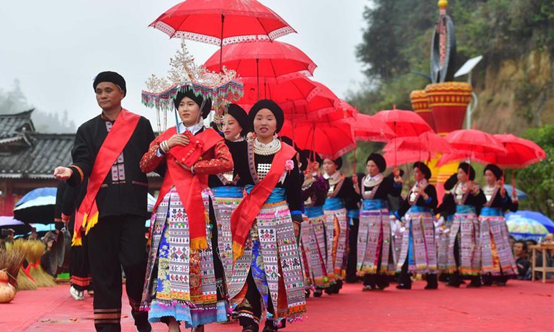 People of Yao ethnic group perform during harvest festival in Guangxi ...